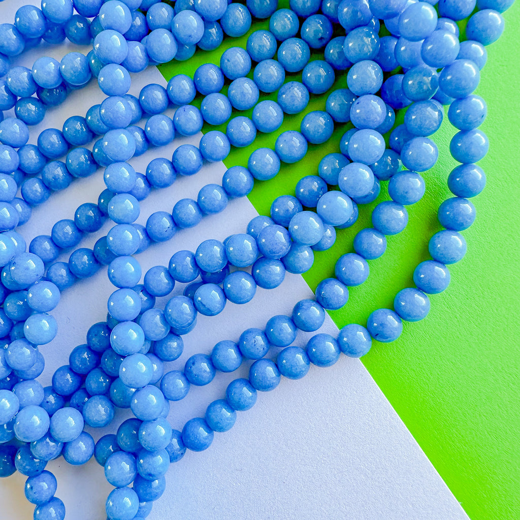 6mm Bright Blue Dyed Calcite Round Strand – Beads, Inc.