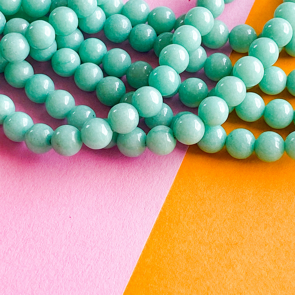 6mm Smooth Turquoise Dyed Calcite Rounds Strand – Beads, Inc.