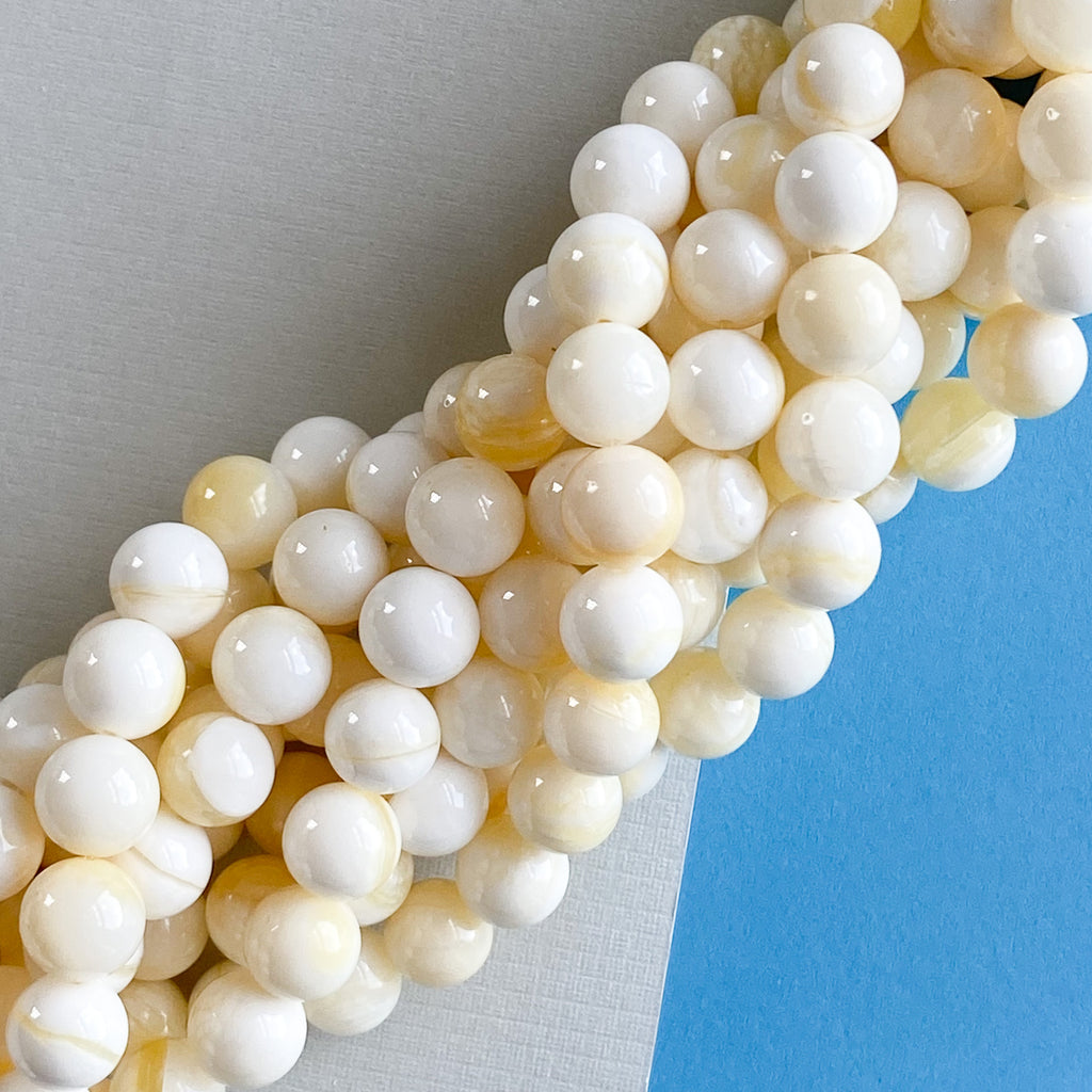 10mm White Shell Round Strand – Beads, Inc.