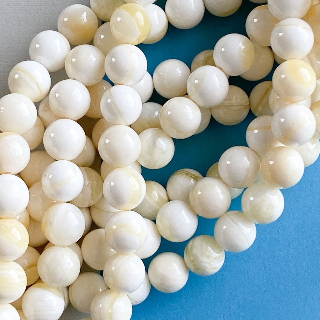 10mm White Shell Round Strand – Beads, Inc.