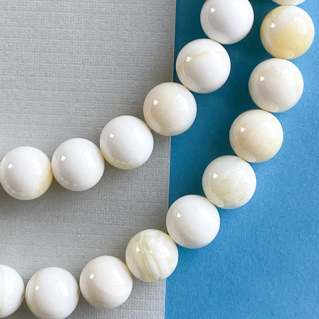 10mm White Shell Round Strand – Beads, Inc.