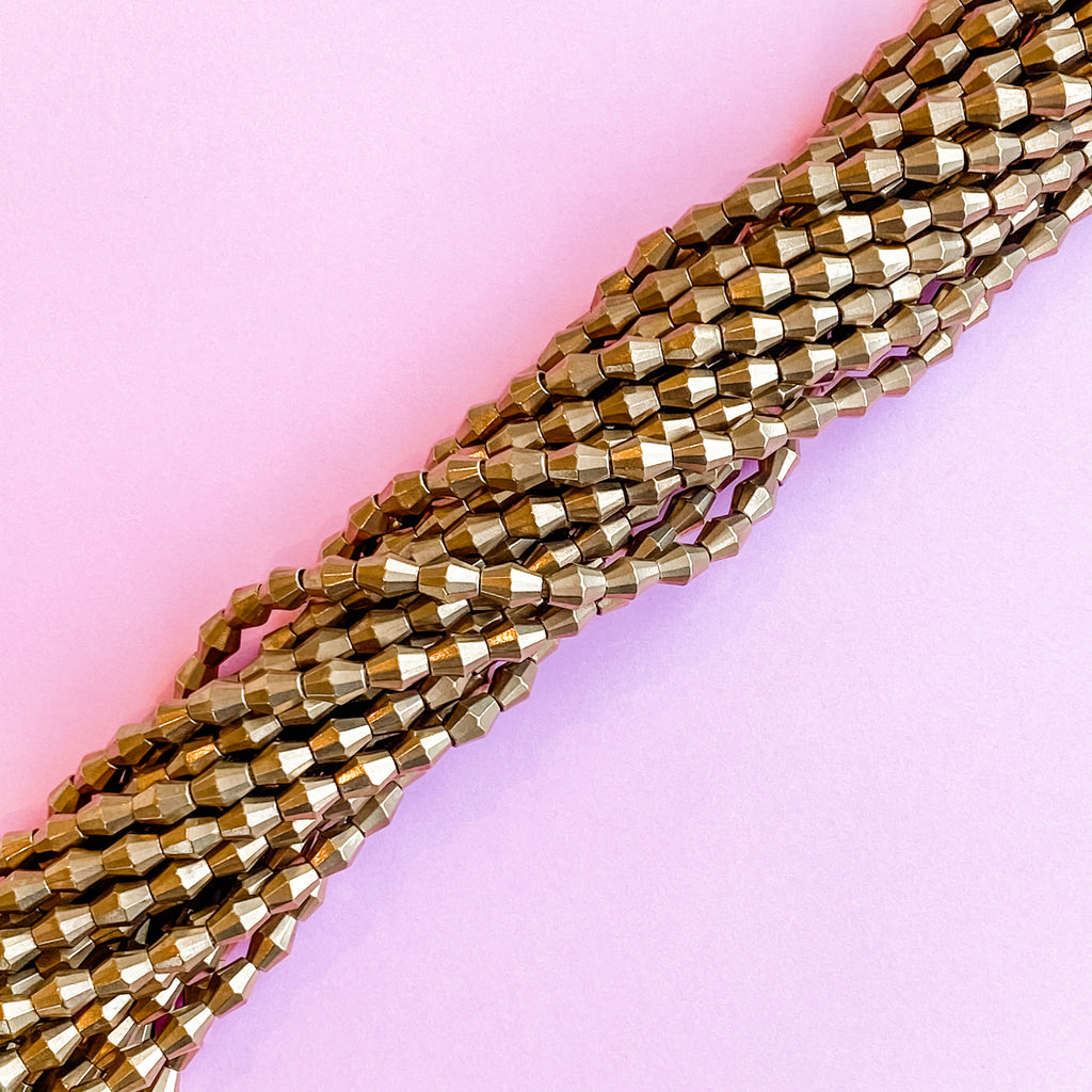 8mm Brass Faceted Marquis Beads – Beads, Inc.