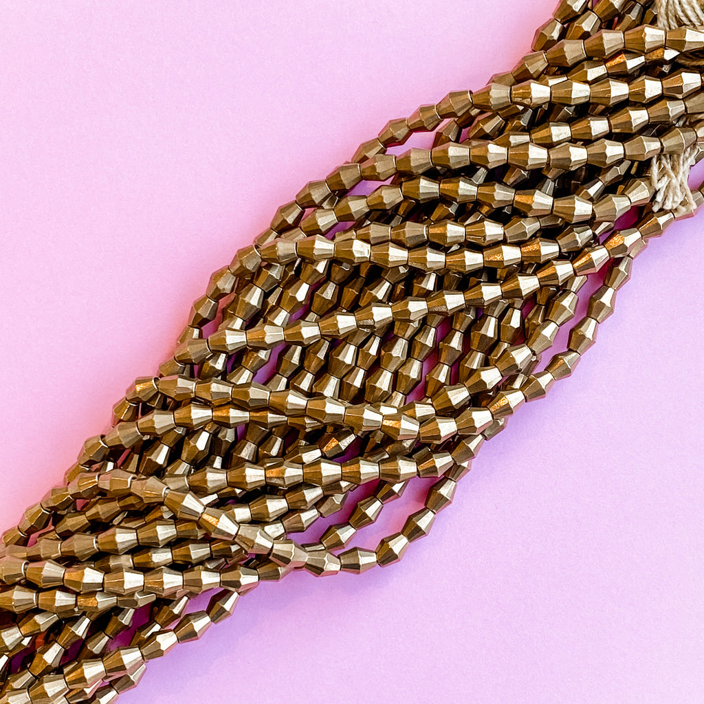 8mm Brass Faceted Marquis Beads – Beads, Inc.