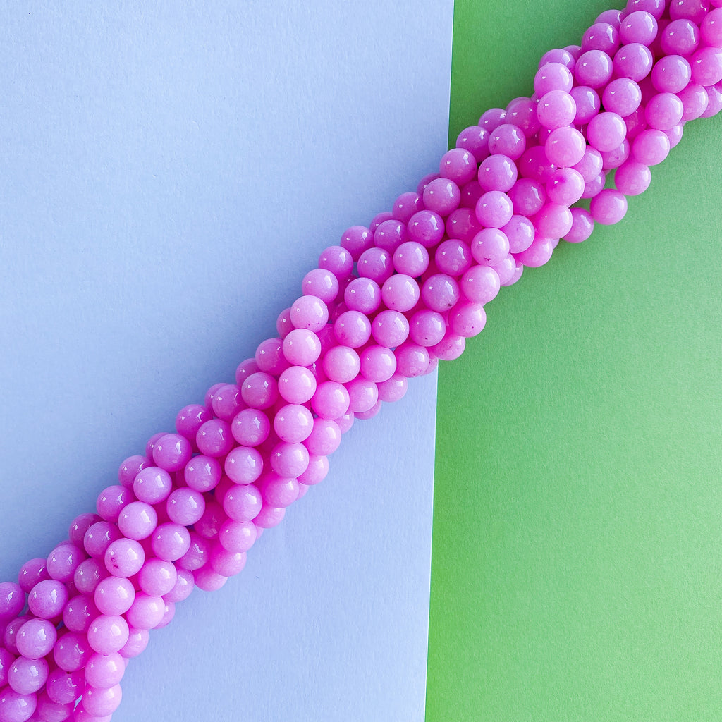 8mm Bubblegum Calcite Rounds Strand – Beads, Inc.