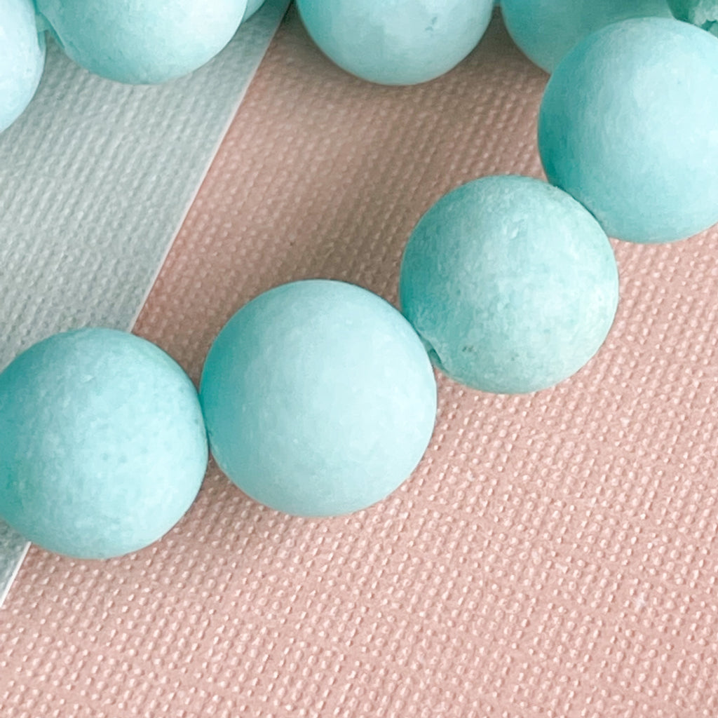 8mm Matte Cyan Dyed Jade Rounds Strand – Beads, Inc.