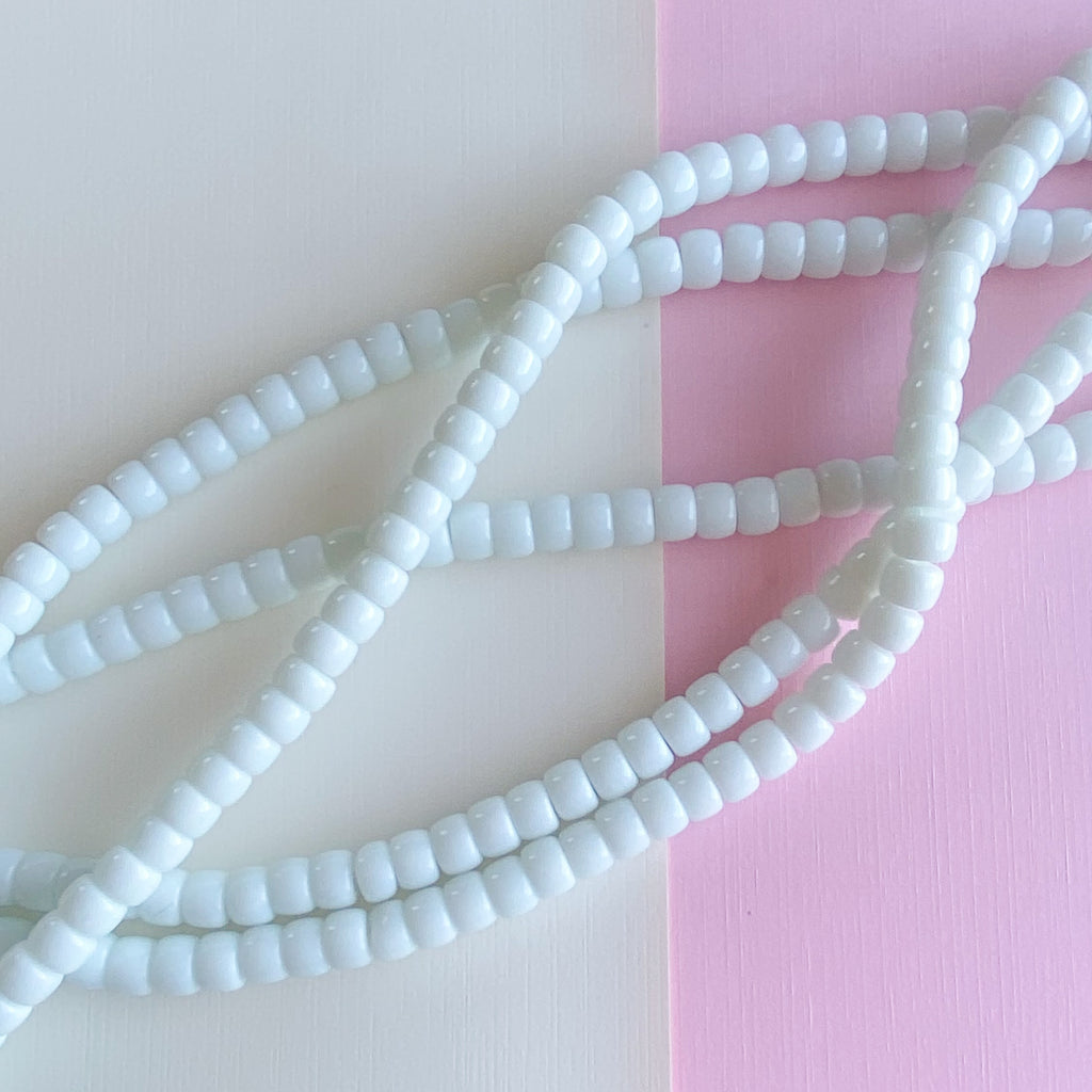 8mm Bright White Glass Roller Strand – Beads, Inc.