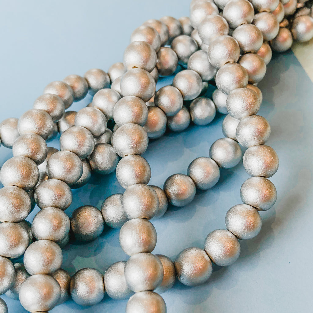 10mm Silver Wood Round Strand – Beads, Inc.