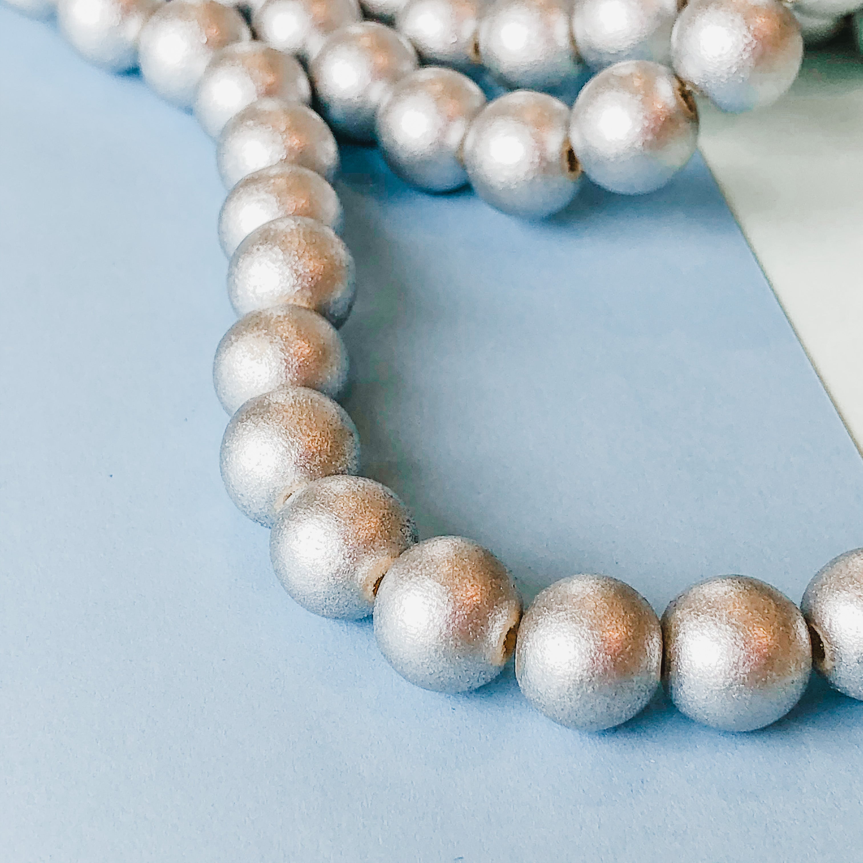 10mm Silver Wood Round Strand – Beads, Inc.