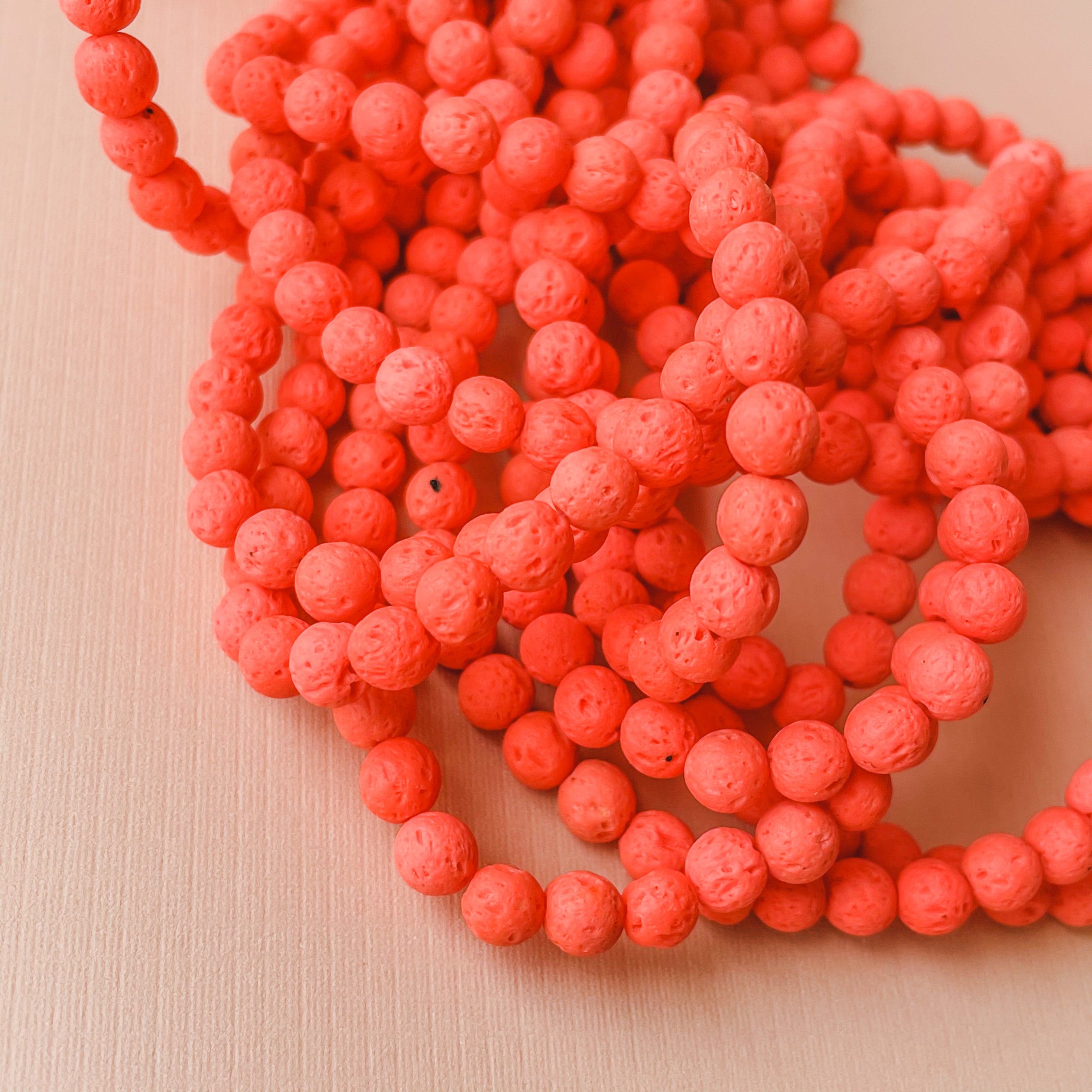 6mm Neon Red Lava Rounds Strand – Beads, Inc.