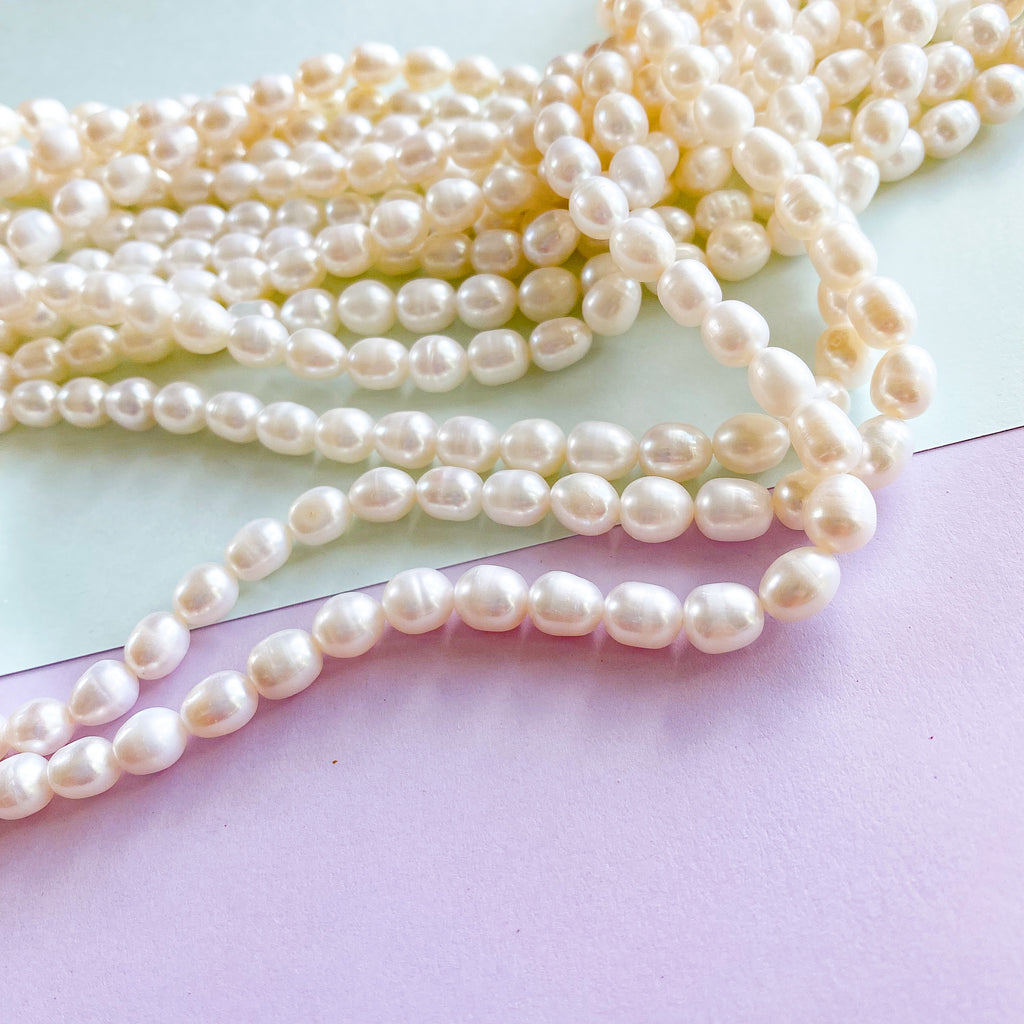 8mm White Freshwater Uniform Rice Pearl Strand – Beads, Inc.